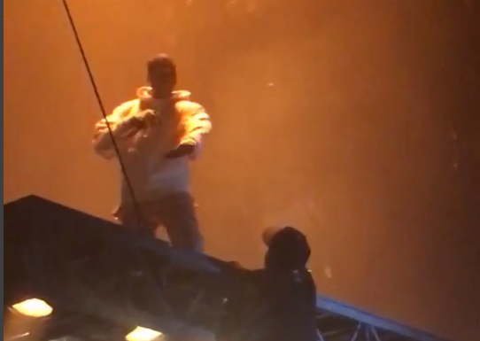 Fan Tries To Climb On Kanye's Floating Stage In Atlanta